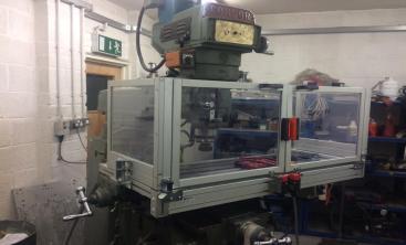 Bi-folding Table Guard for Milling Machines